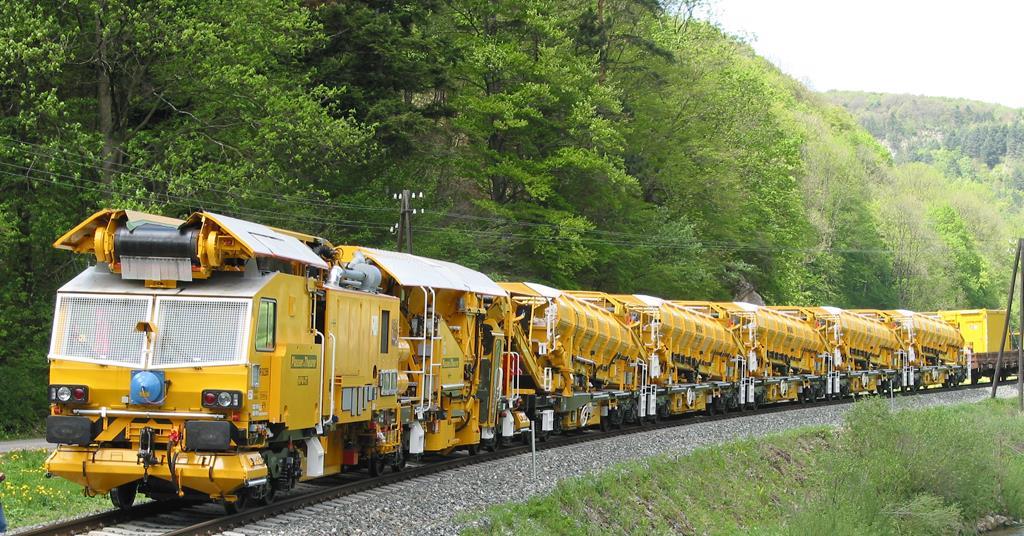 Network Rail orders third rail compatible ballast cleaner | News ...