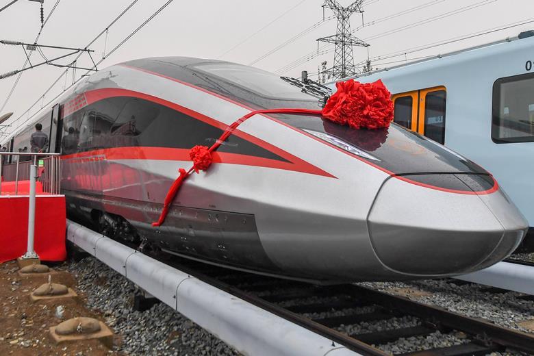 CRRC unveils gauge-changing high speed train | News | Railway Gazette ...