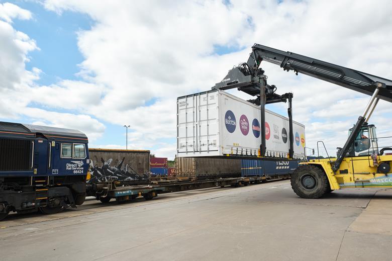 Raising-roof container designed to get supermarket goods onto rail ...
